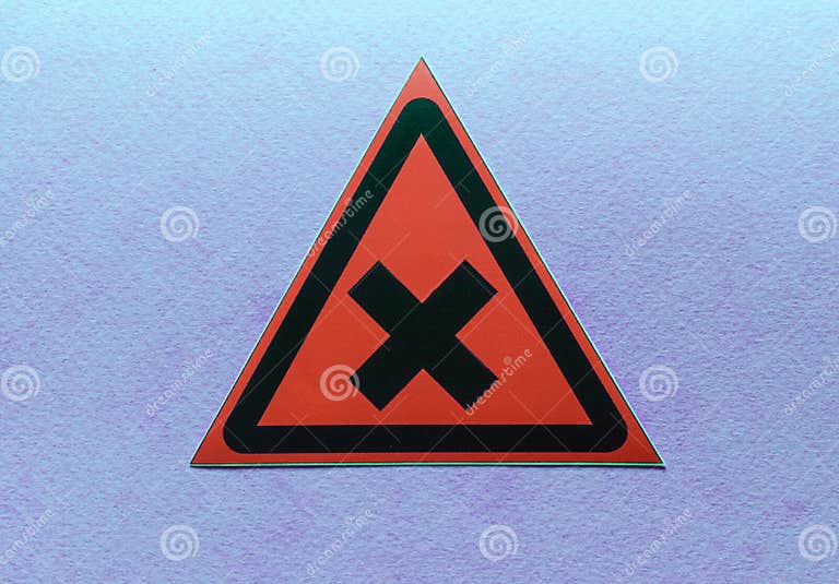 Warning Sign Two Intersecting Lines in a Red Triangle on a Blue ...