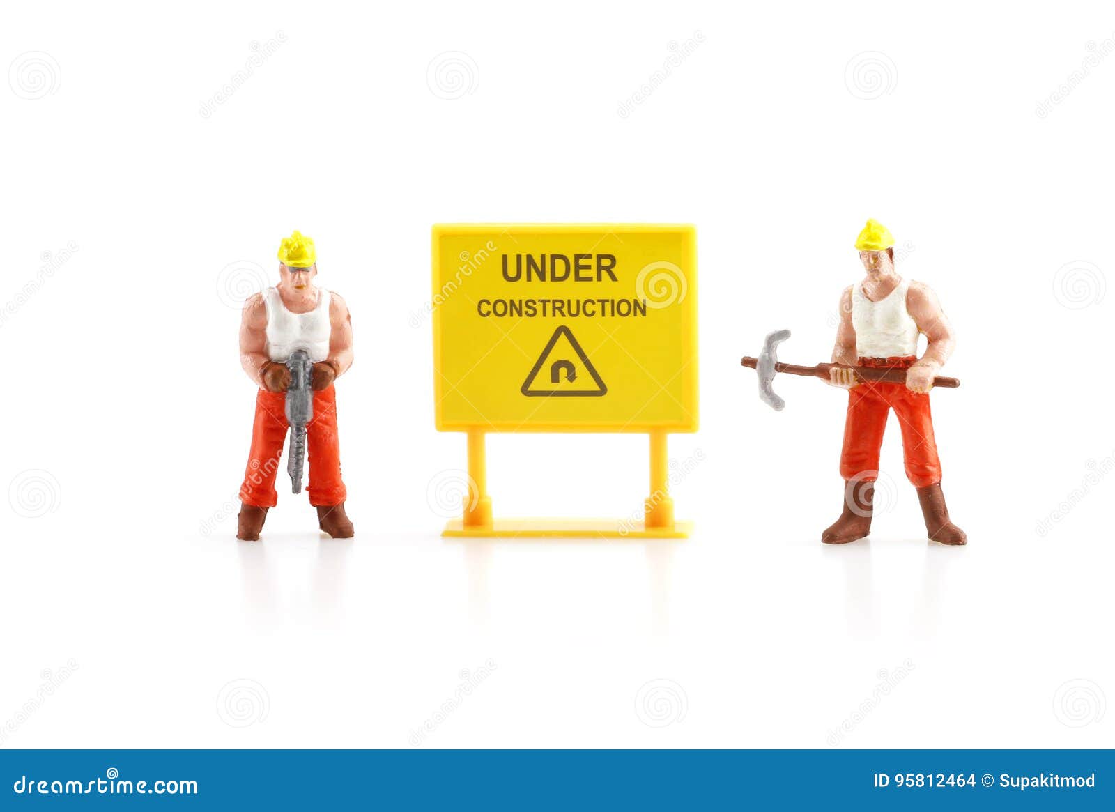 Warning Sign Under Construction with Miniature Figure Labo Stock Photo ...
