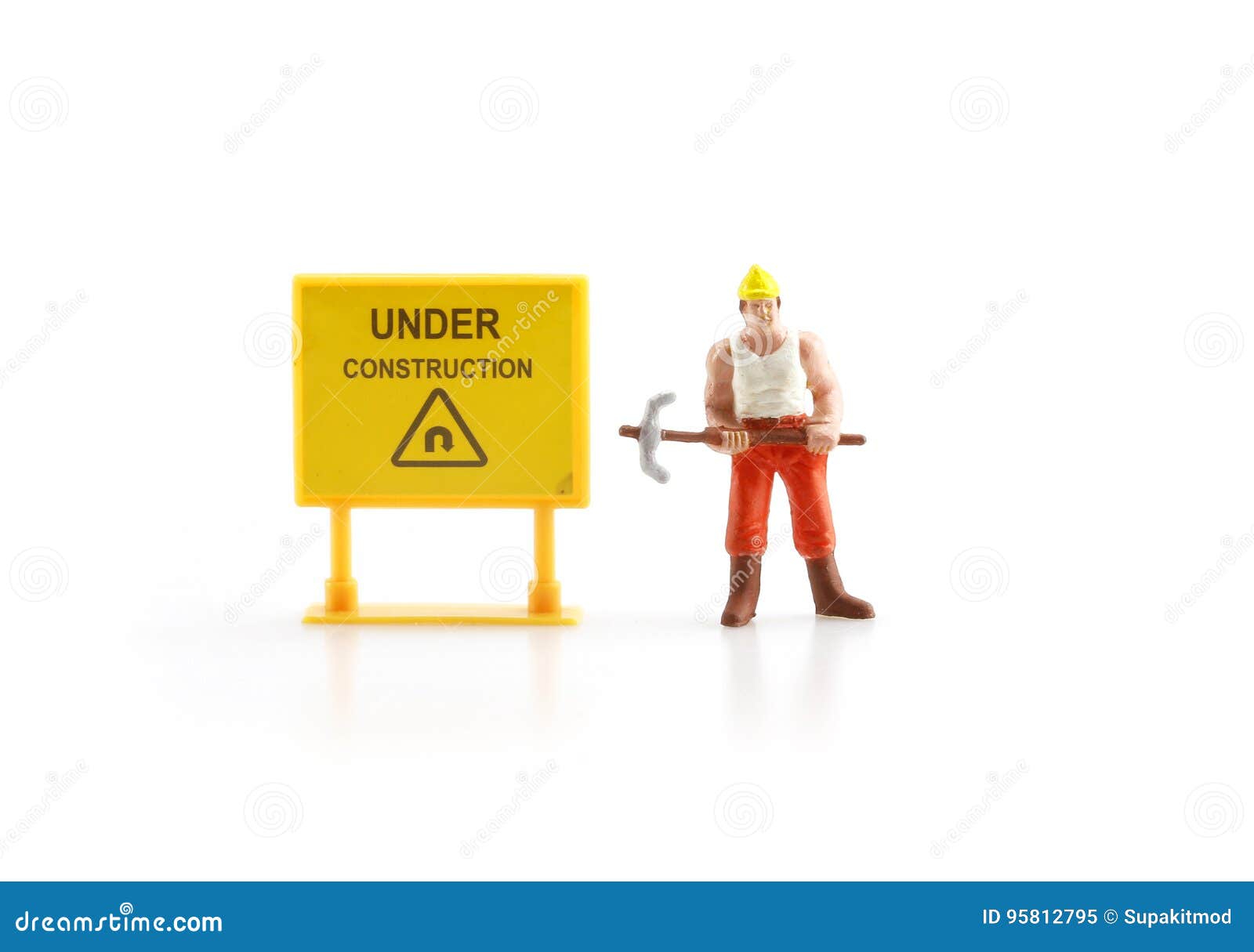 Warning Sign Under Construction with Miniature Figure Labo Stock Image ...