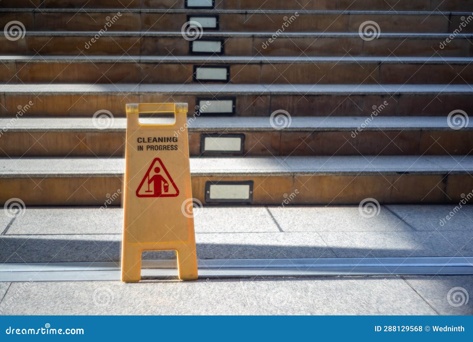 The Warning Signs Cleaning in Process the Floor of the Building. Stock ...
