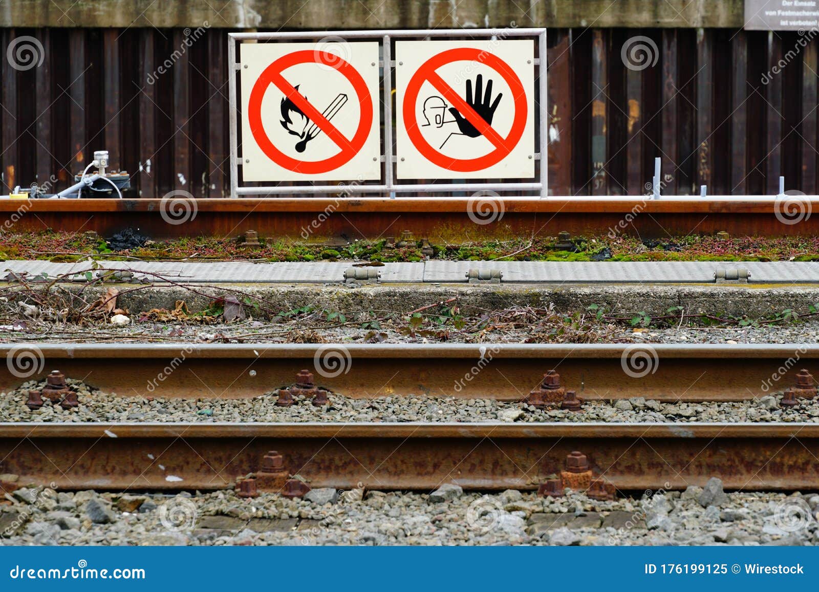 Warning Signs in the Railway Station Near the Rails Stock Image - Image ...