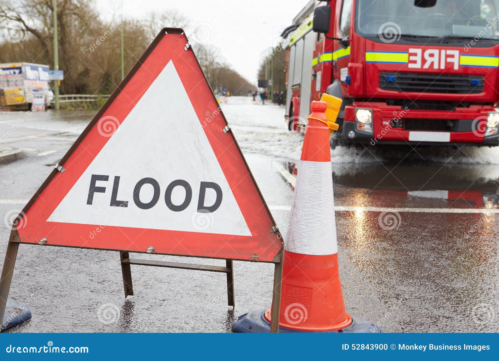 Warning Traffic Sign on Flooded Road with Fire Engine Stock Photo ...