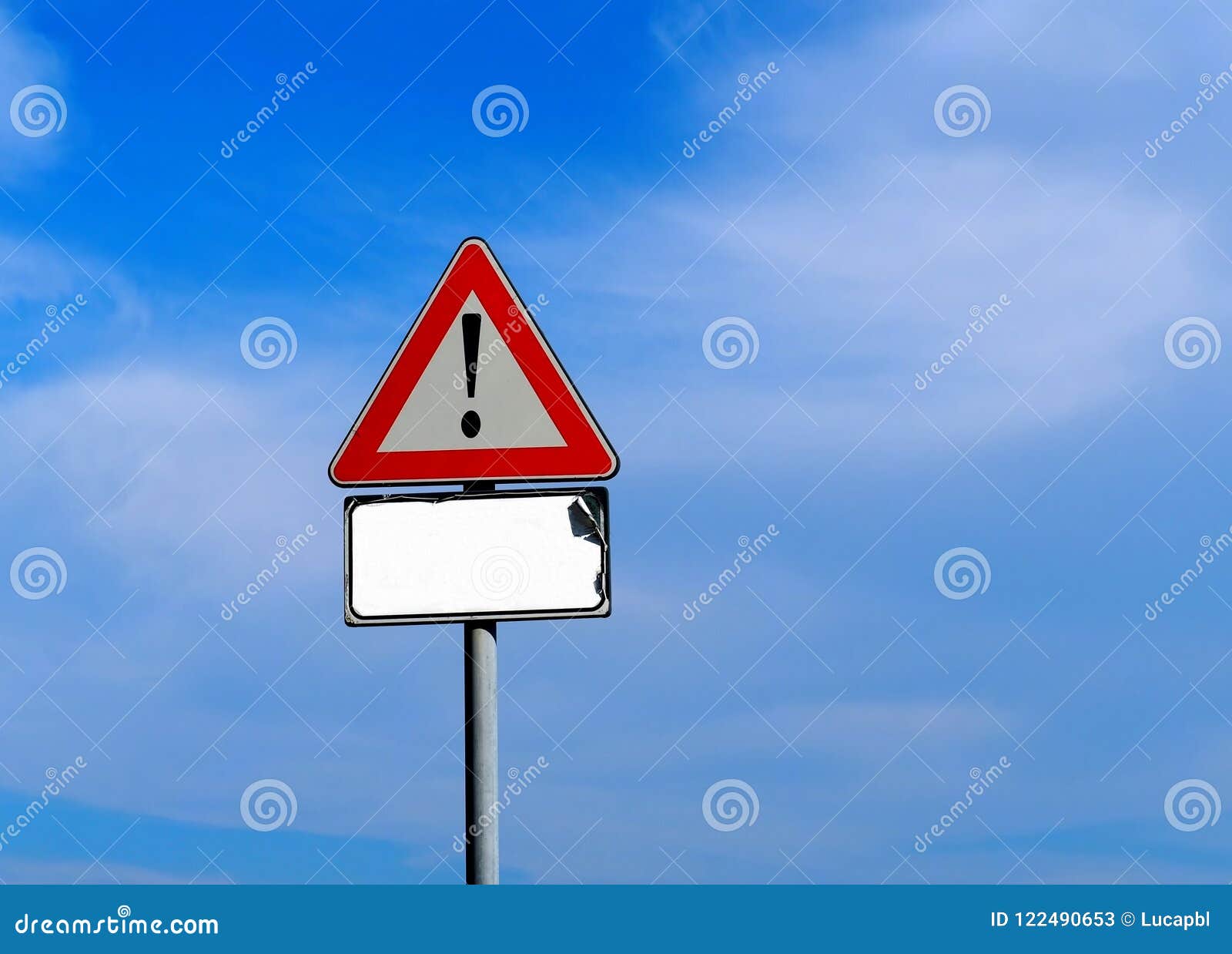 Warning Triangular Sign with Exclamation Mark. a Worn White Signpost is ...