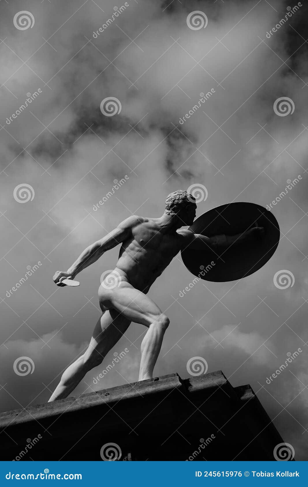 Warrior Statue with Sword and Shield Stock Photo - Image of statue ...