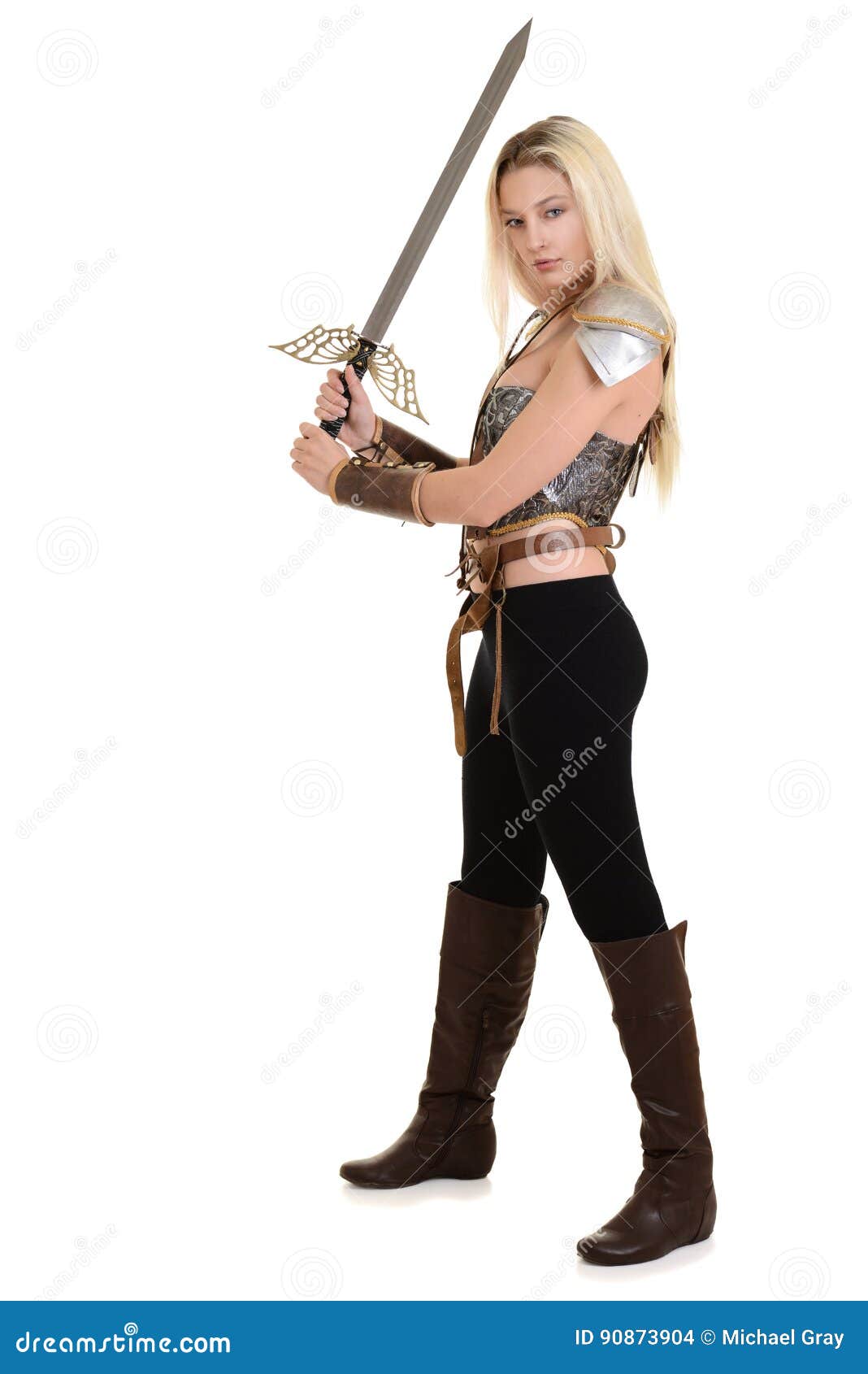 Warrior Woman Using Two Handed Sword Stock Photo - Image of boots ...