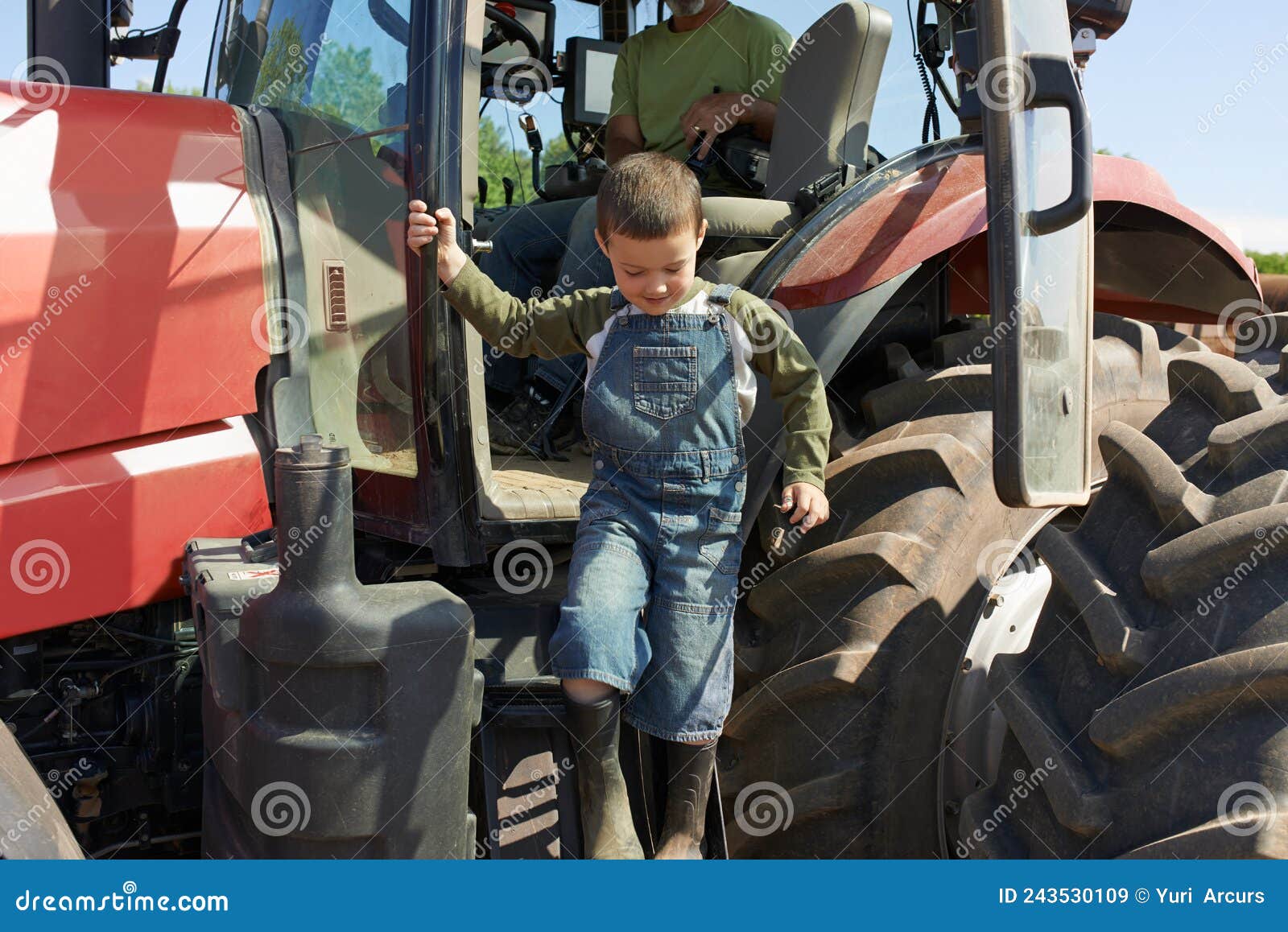 That Was a Hard Days Working. Shot of a Little Boy Climbing Down from a ...