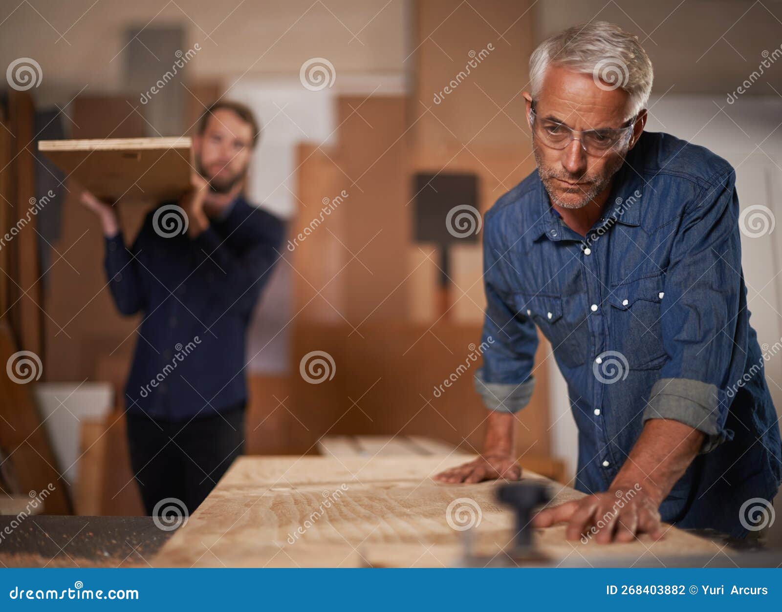 He Was the Most Helpful Apprentice Around. a Father and Son Working ...