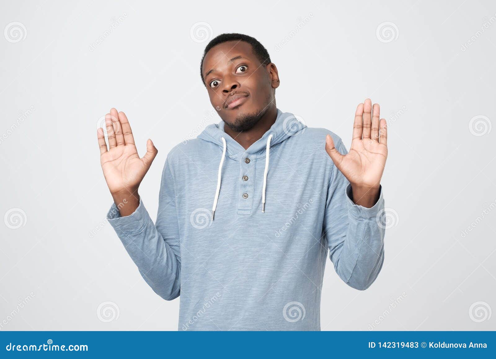Confused African Man Raising Palms In Surrender, Shrugging And Making ... Confused African Man Raising Palms In Surrender, Shrugging And Making ...