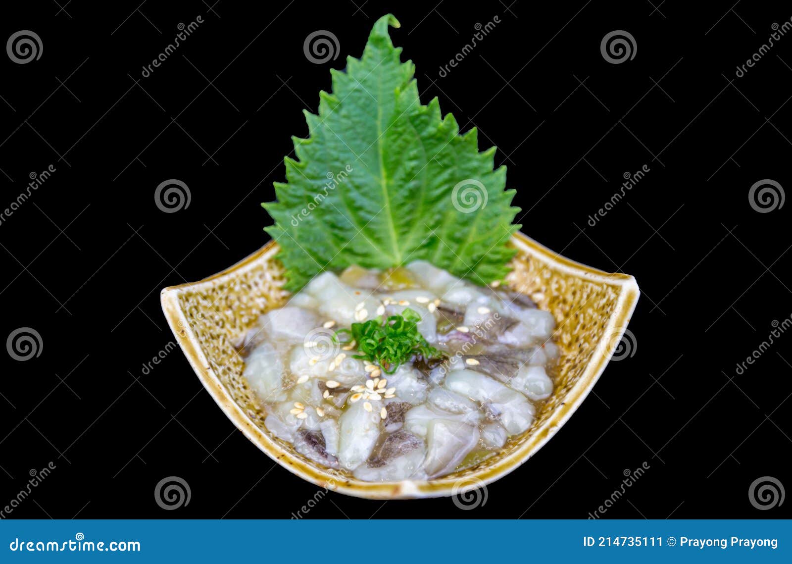 Wasabi Pickled Squid with Oba Leaves in a Tile Bowl Stock Image - Image ...