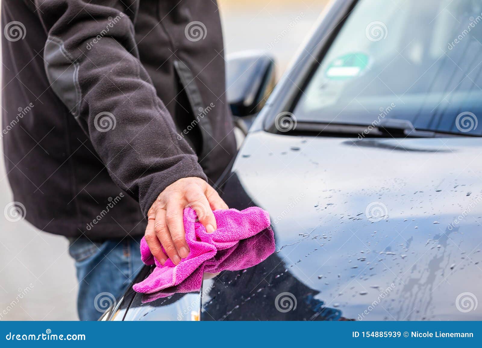 Wash the car with a rag stock image. Image of operation - 154885939