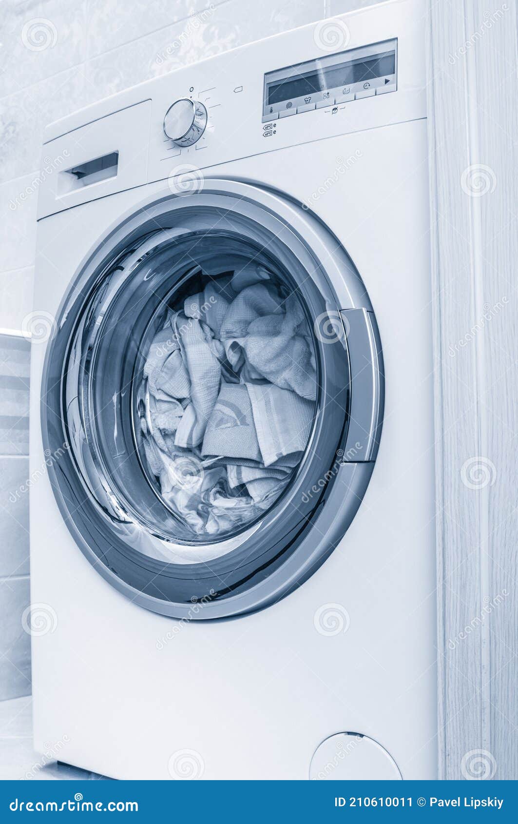 Wash Clothes in Washing Machine Close Up. Toned Image Stock Image ...
