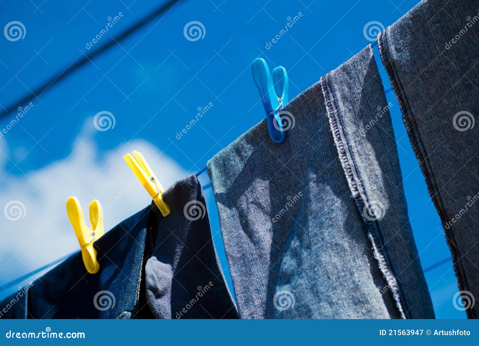 Washed Blue Jeans Drying Outside Stock Image - Image of wind, washed ...