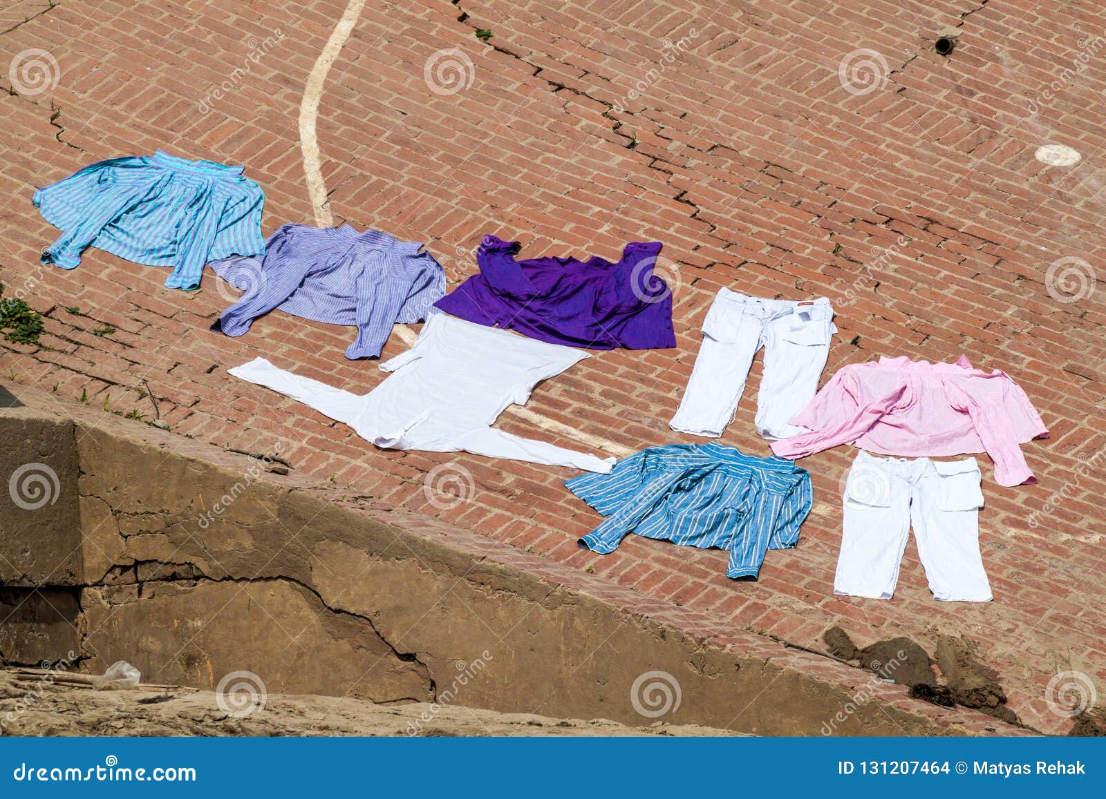 Washed Clothes Being Dried at a Ghat Riverfront Steps in Varanasi, Ind ...