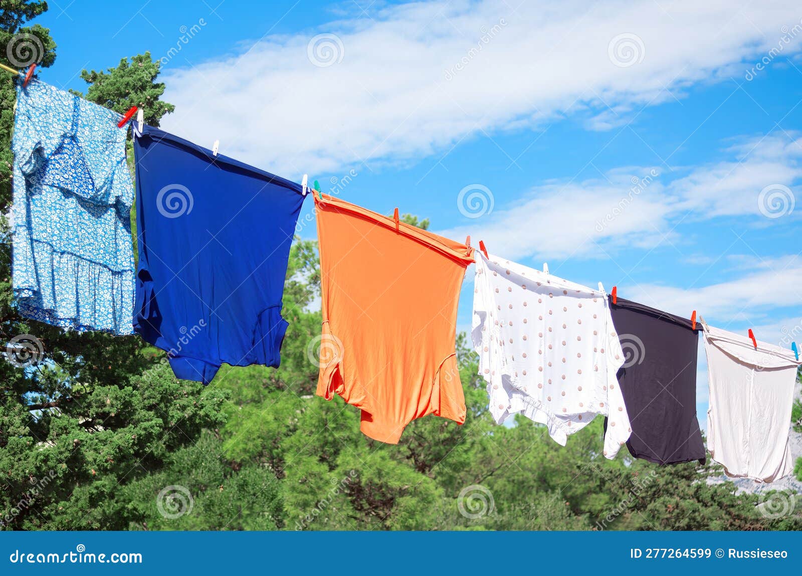 Washed clothes on rope stock image. Image of vibrant - 277264599
