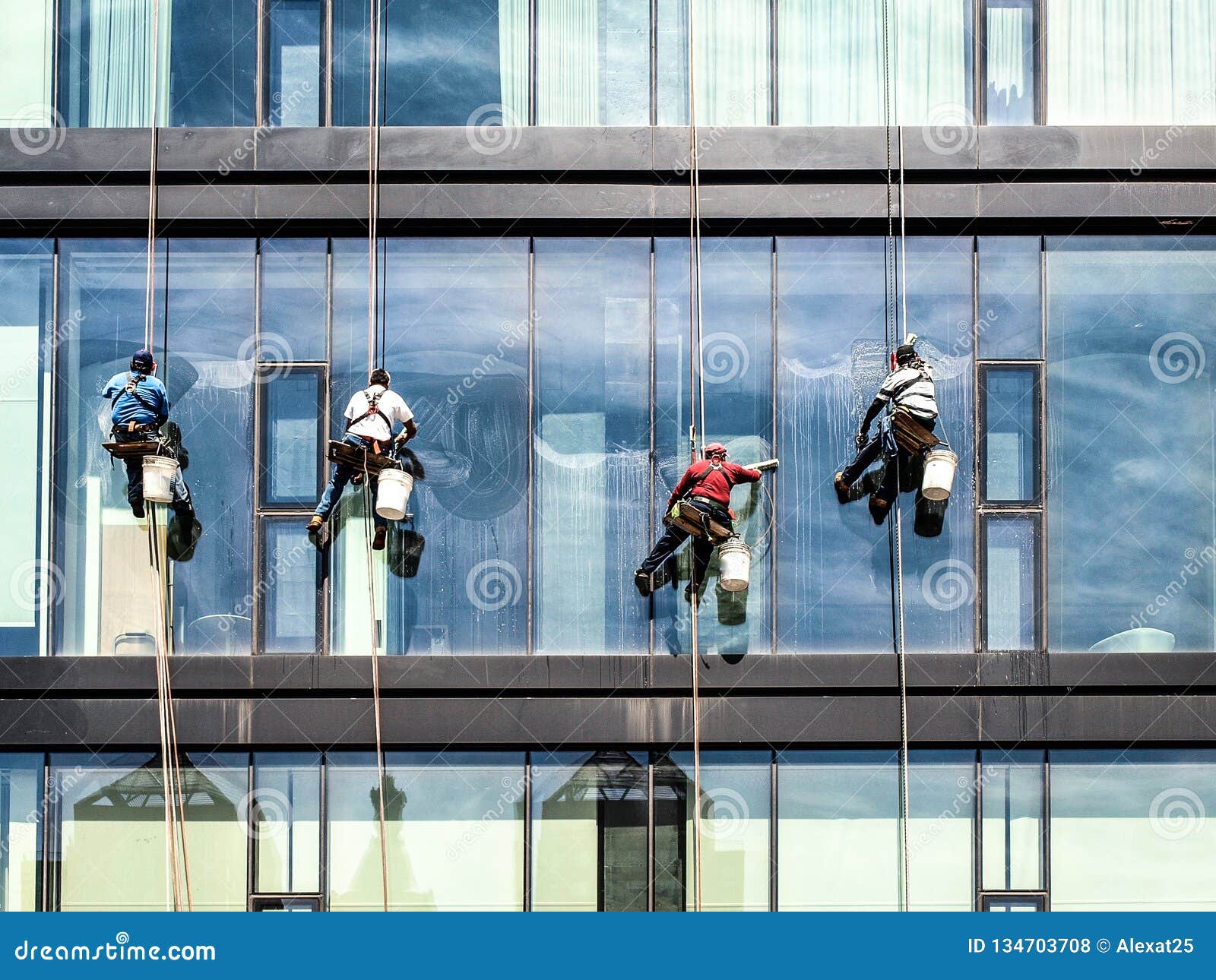 Washers Wash The Windows Of Modern Skyscraper Royalty-Free Stock Photo ...