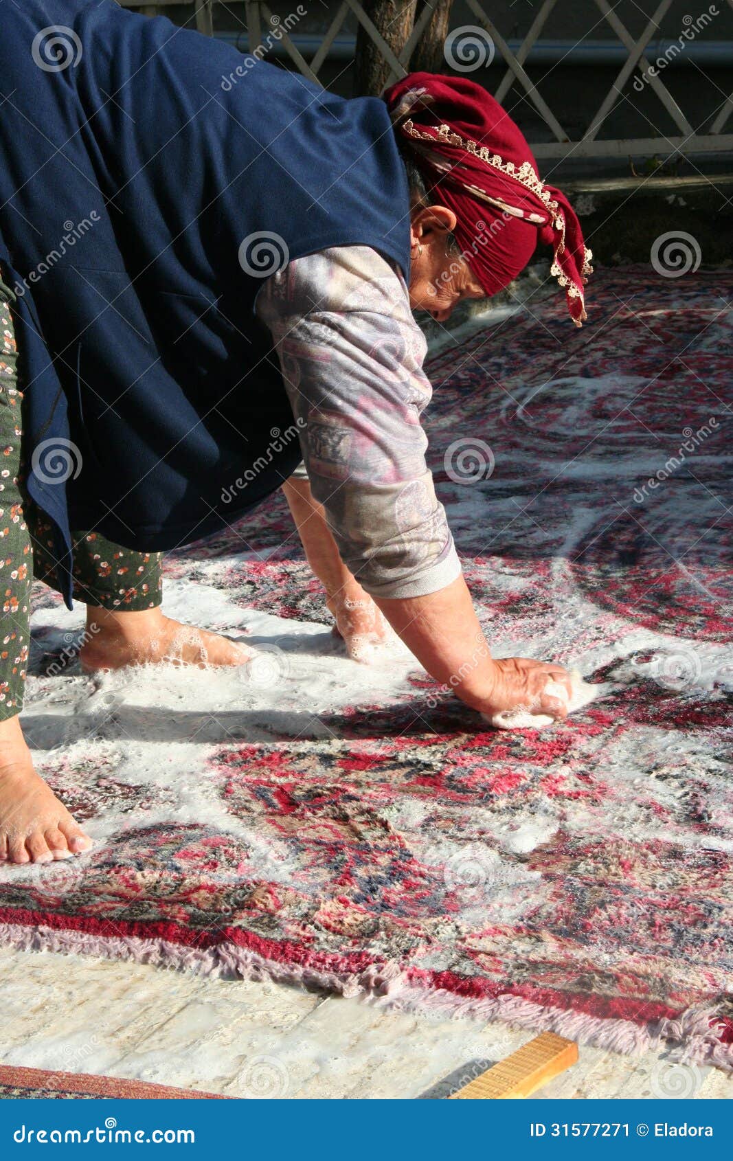 Washing the carpet stock image. Image of woman, traditional - 31577271