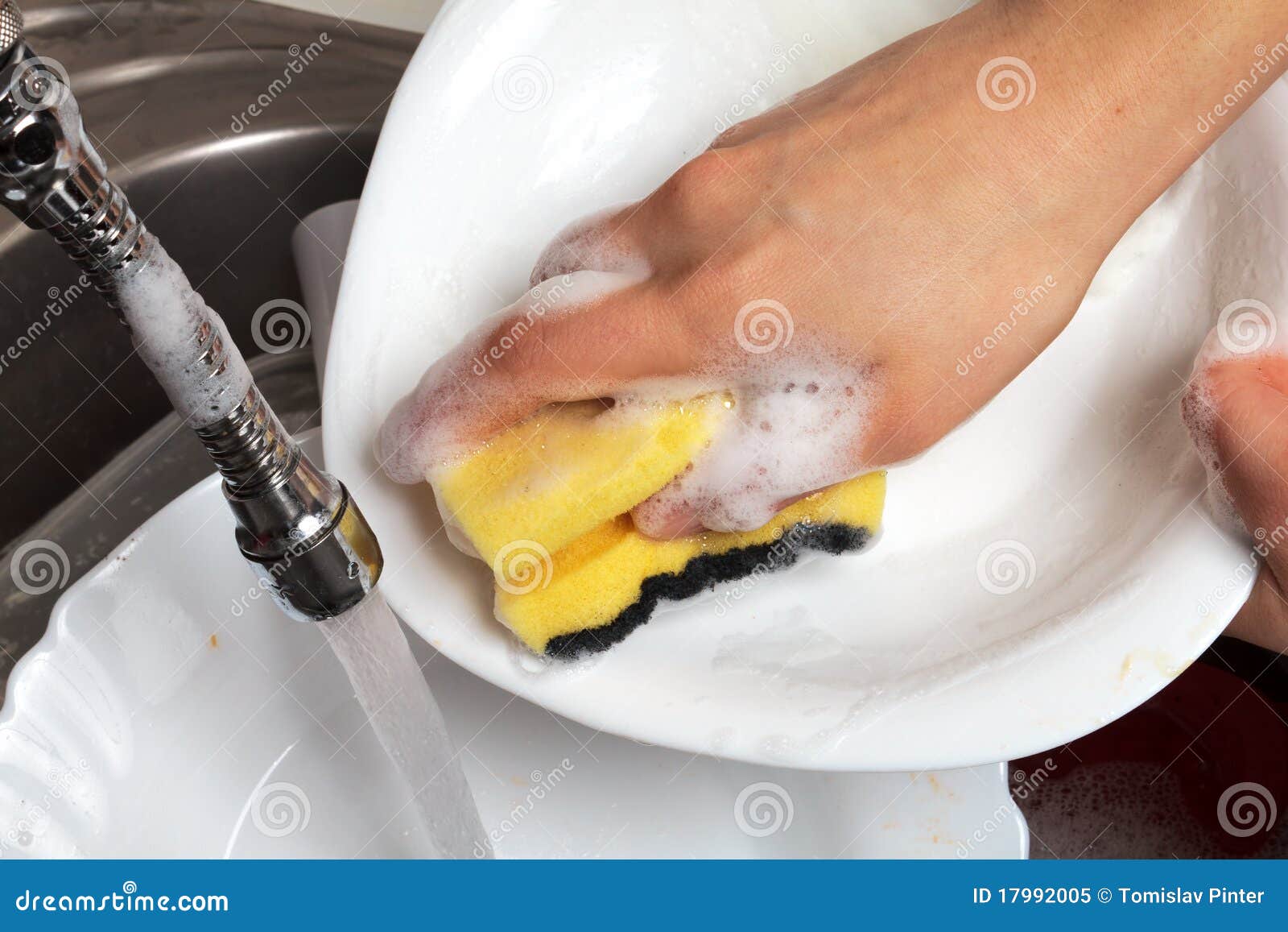 Washing the dishes stock image. Image of scour, cleanup - 17992005