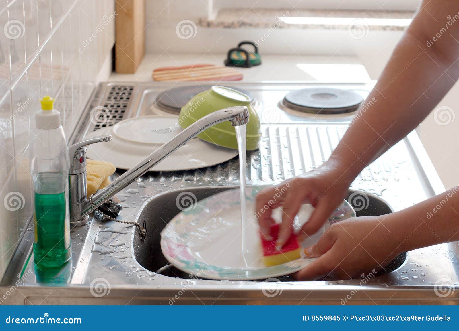 Washing dishes stock image. Image of kitchen, sanitary - 8559845