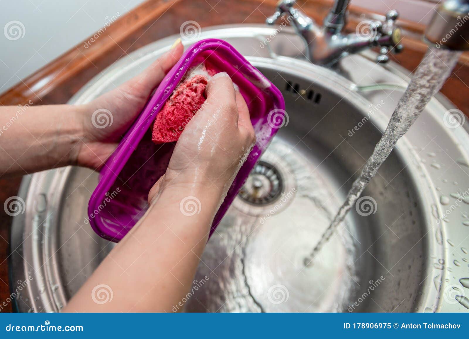 Washing the Dishes in the Kitchen Sink Stock Image - Image of housework ...