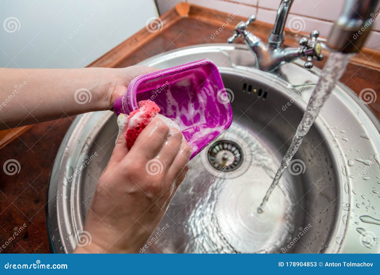 Washing the Dishes in the Kitchen Sink Stock Image - Image of household ...