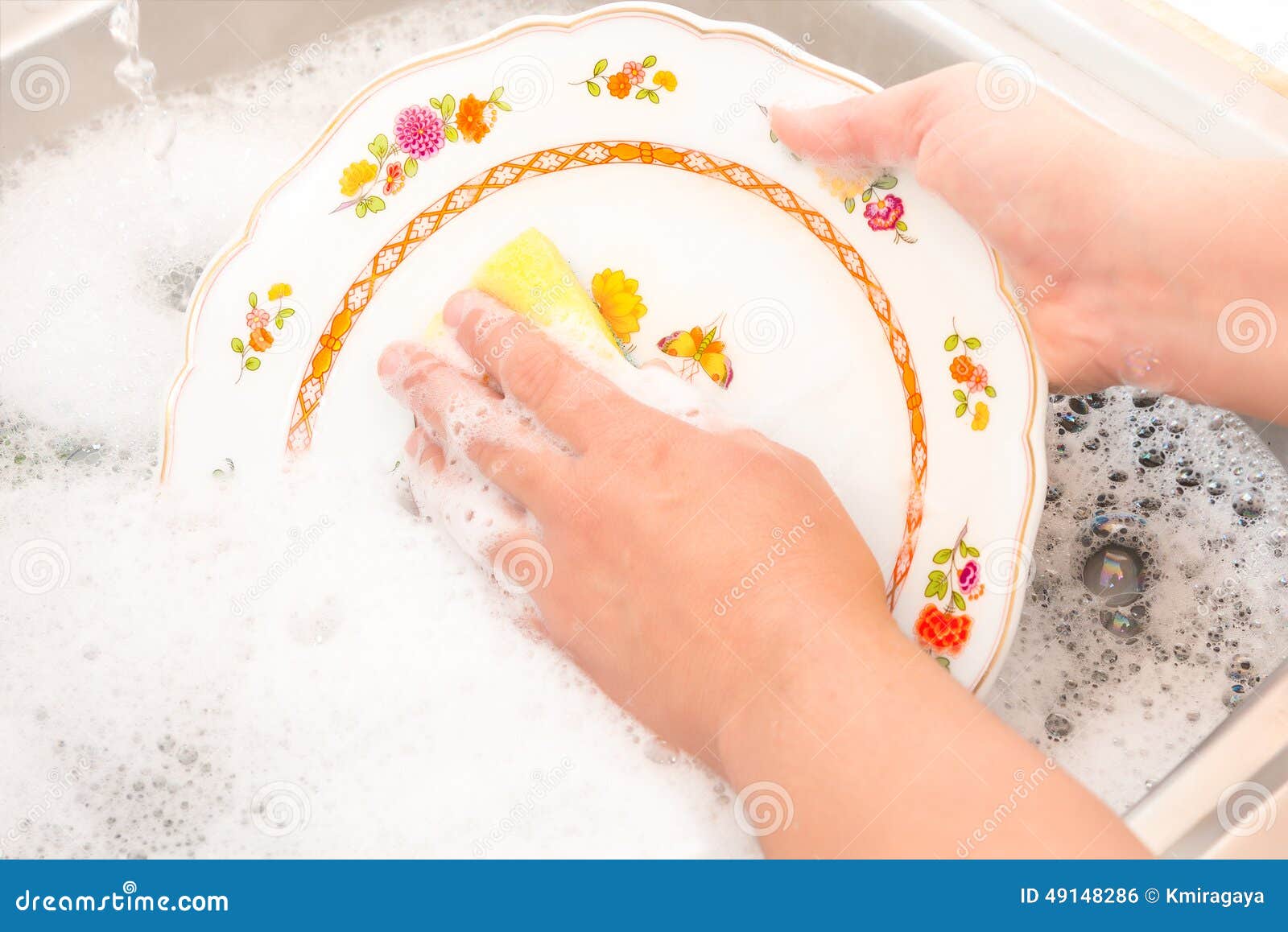 Washing the Dishes on the Kitchen Sink Stock Photo - Image of ...