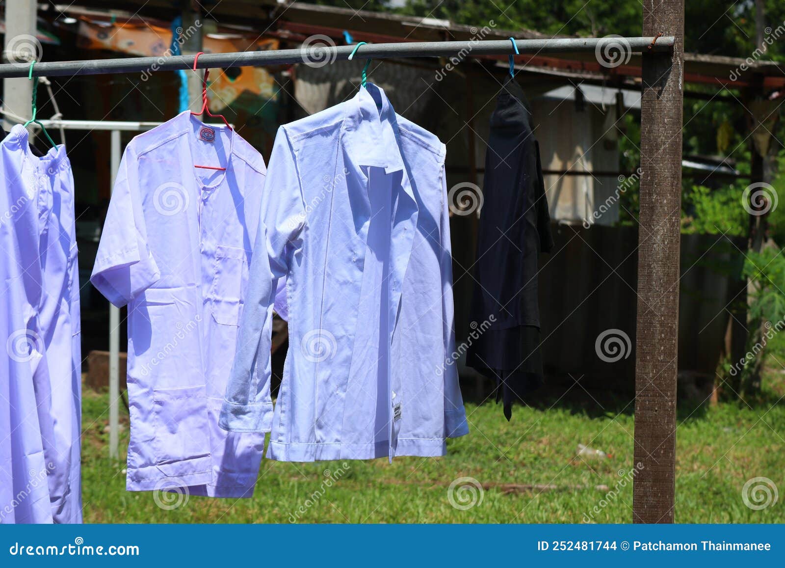 Washing and Drying Clothes in the Morning Sun Stock Photo - Image of ...