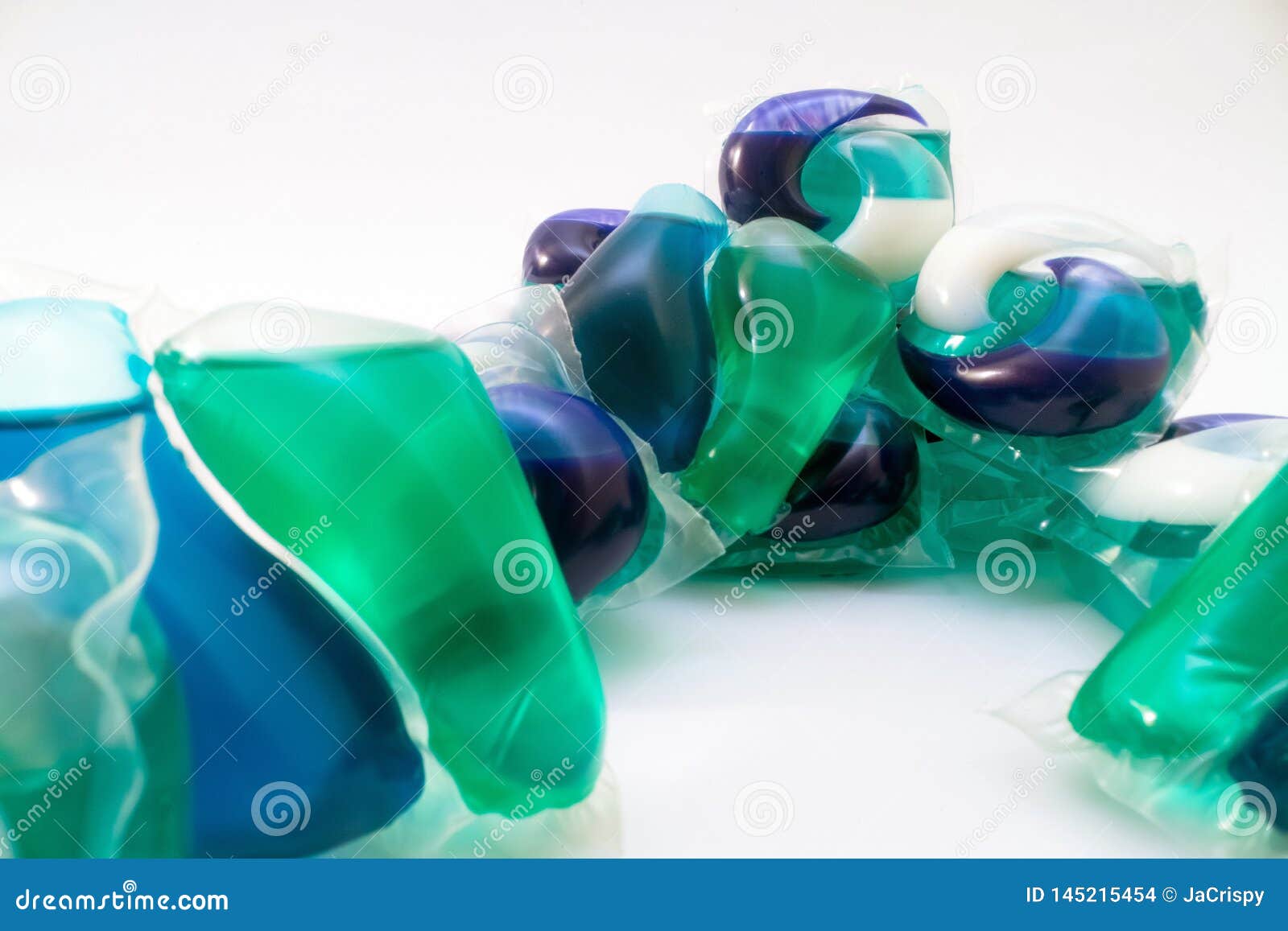 Washing Gel Capsules Stack On White Background Dissolving Laundry ...