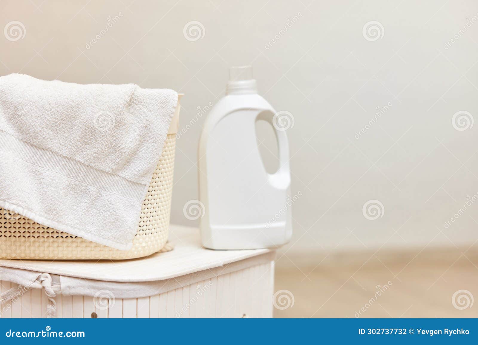Washing Gel or Fabric Softener on White Laundry Basket. Stock Photo ...