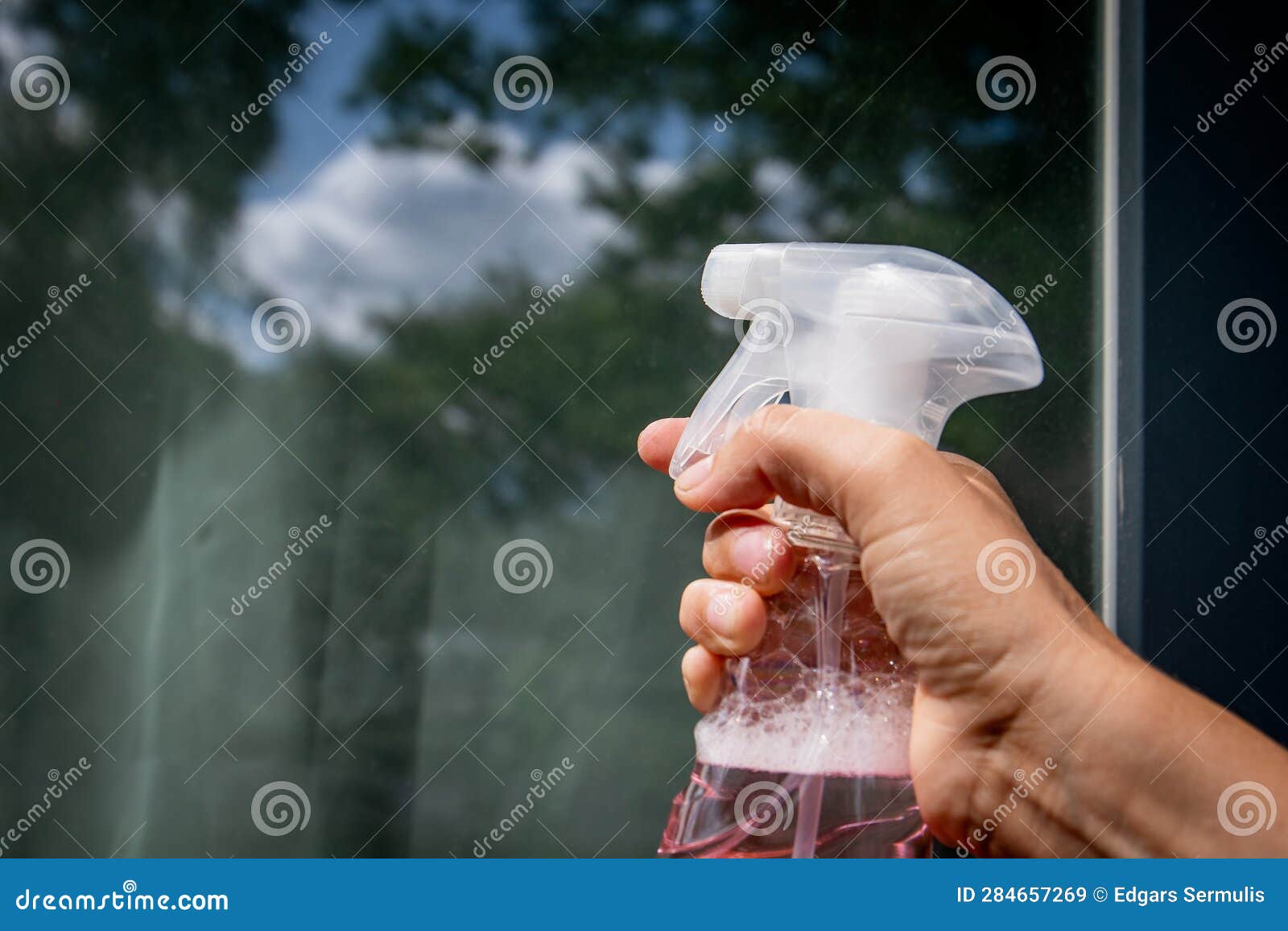 Washing the Glass on the Windows with Spray Stock Image - Image of ...