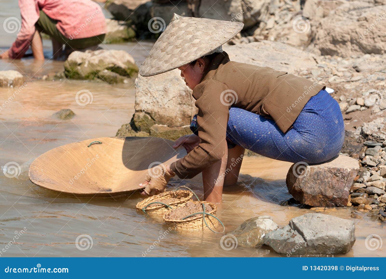 Washing gold in the river stock photo. Image of wash - 13420398