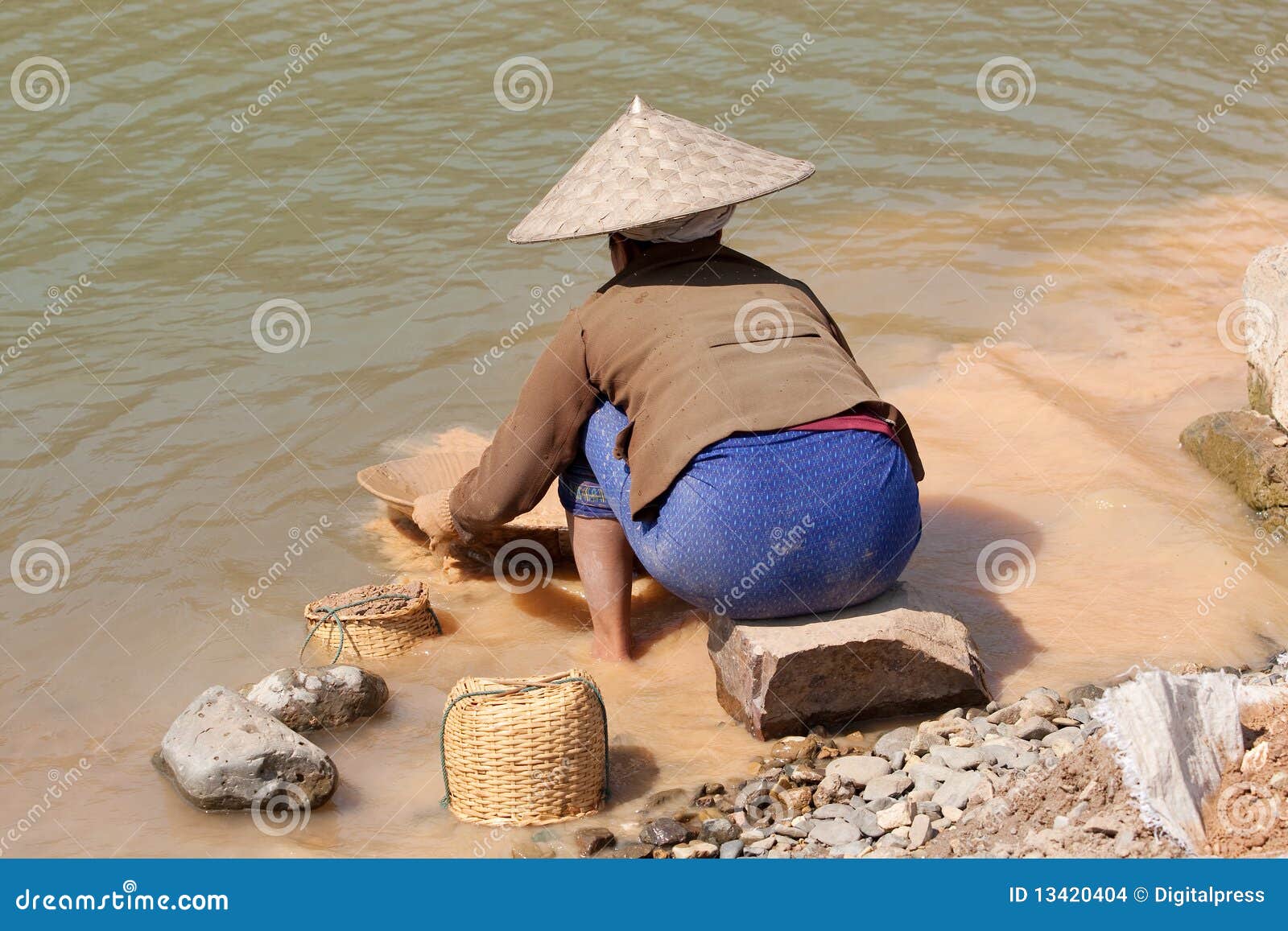 Washing gold in the river stock photo. Image of wash - 13420404