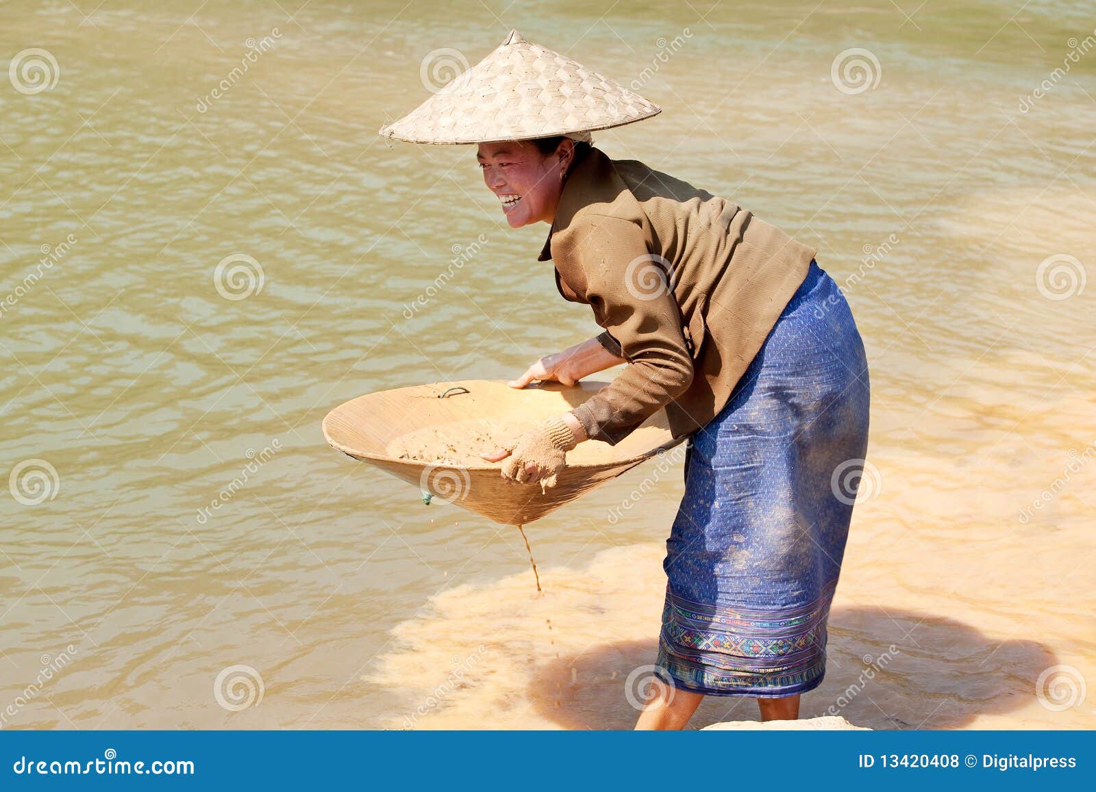 Washing gold in the river stock photo. Image of stone - 13420408