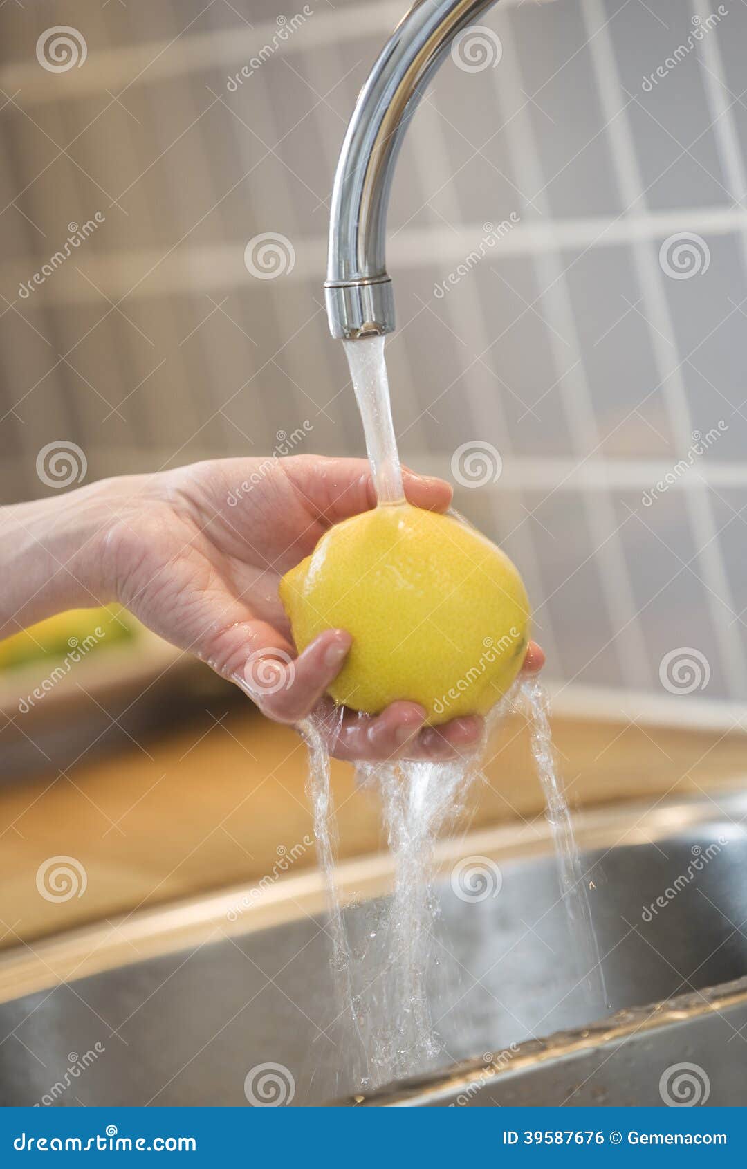 Washing Lemon stock photo. Image of kitchen, holding - 39587676