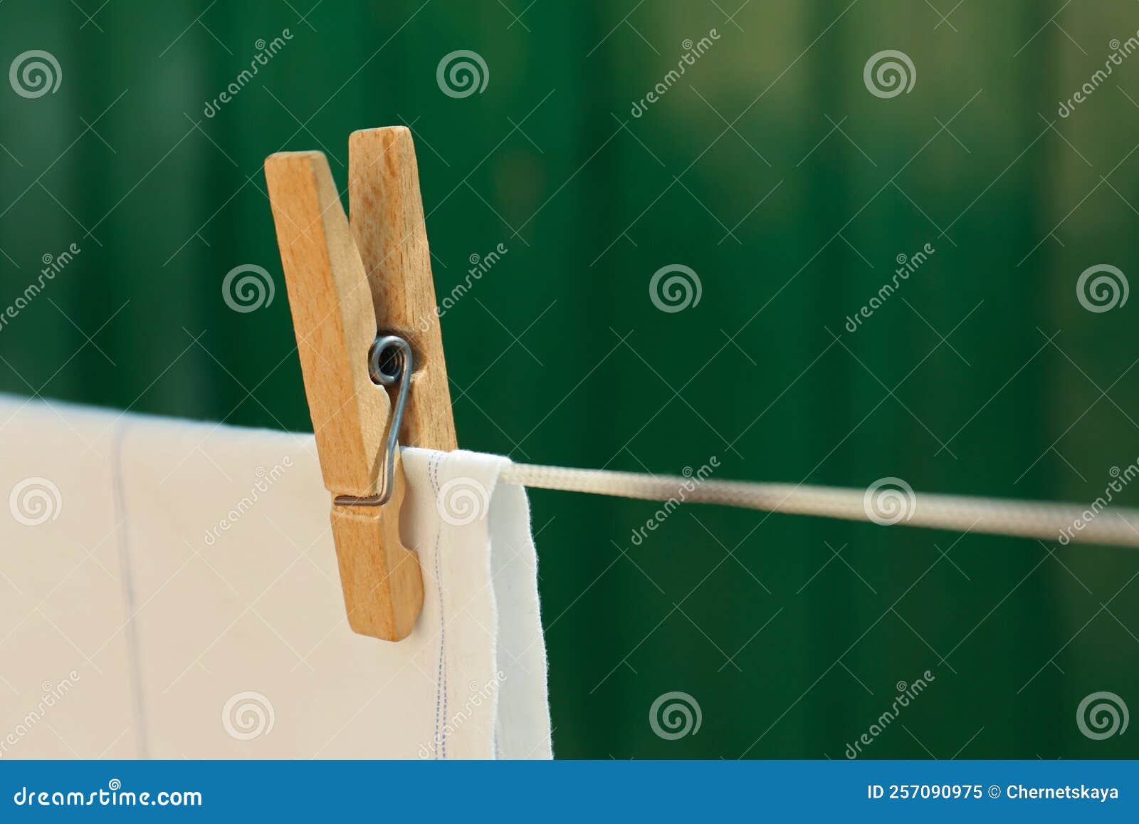 Washing Line with Clean Laundry and Clothespin Outdoors, Closeup Stock ...