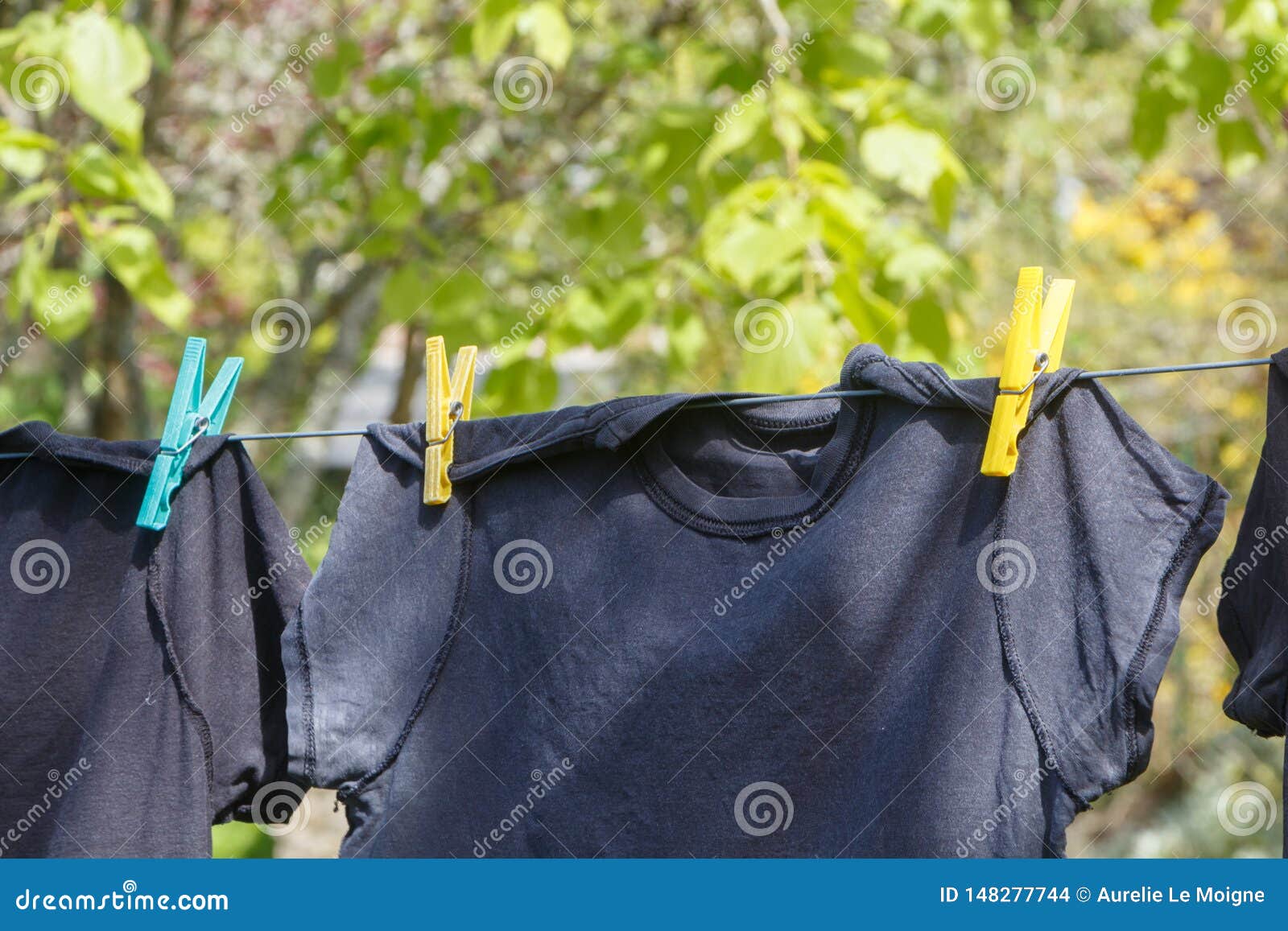Washing line with clothes stock photo. Image of laundry - 148277744