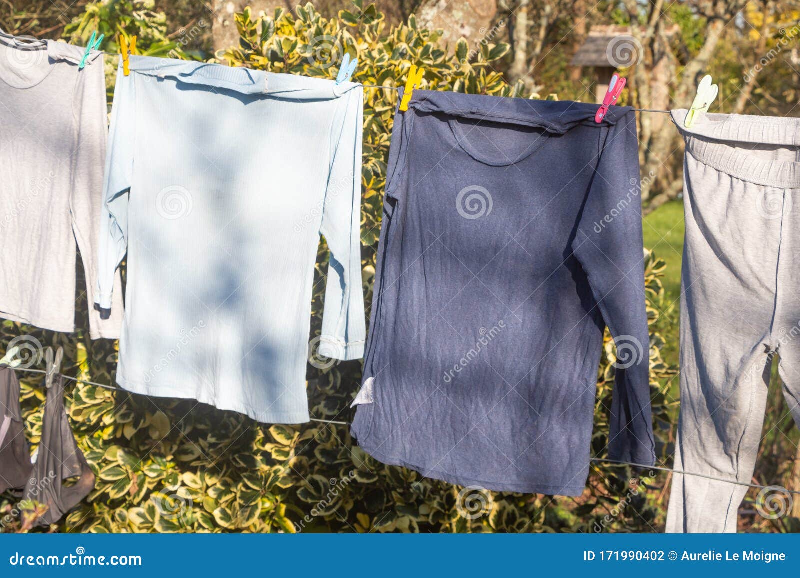 Washing line with clothes stock photo. Image of washing - 171990402