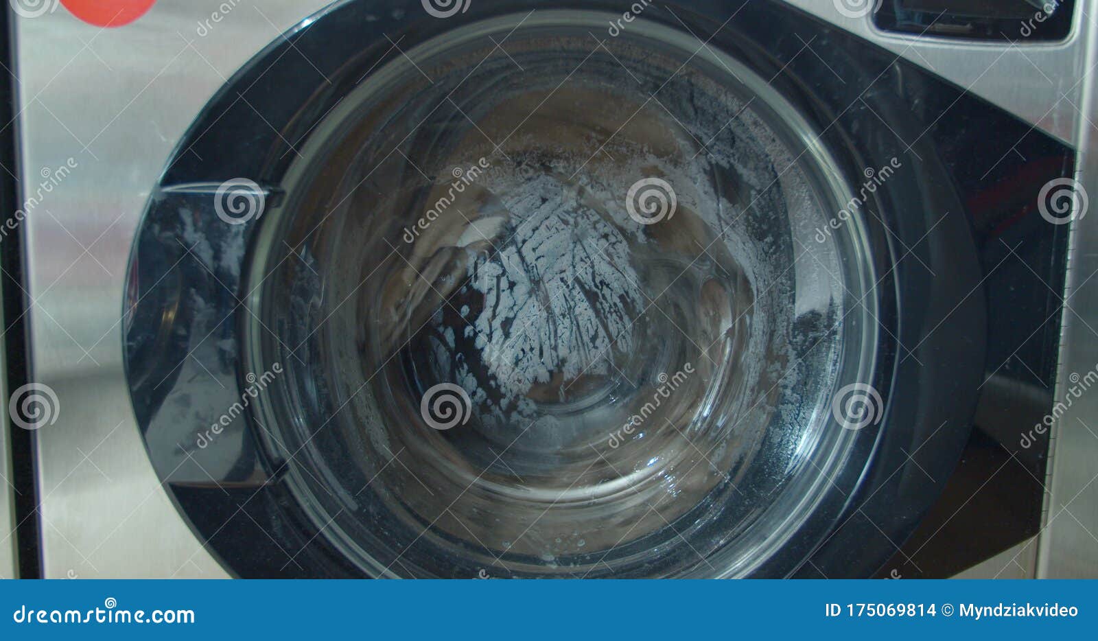 Washing Machine Cleaning Clothes at Laundromat in Slow Motion. Stock ...