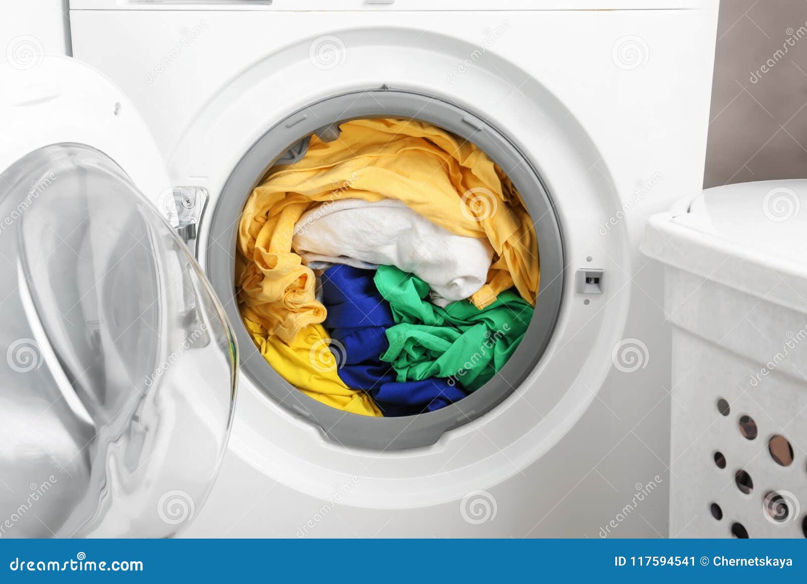 Washing Machine with Clothes, Closeup Stock Image - Image of linen ...