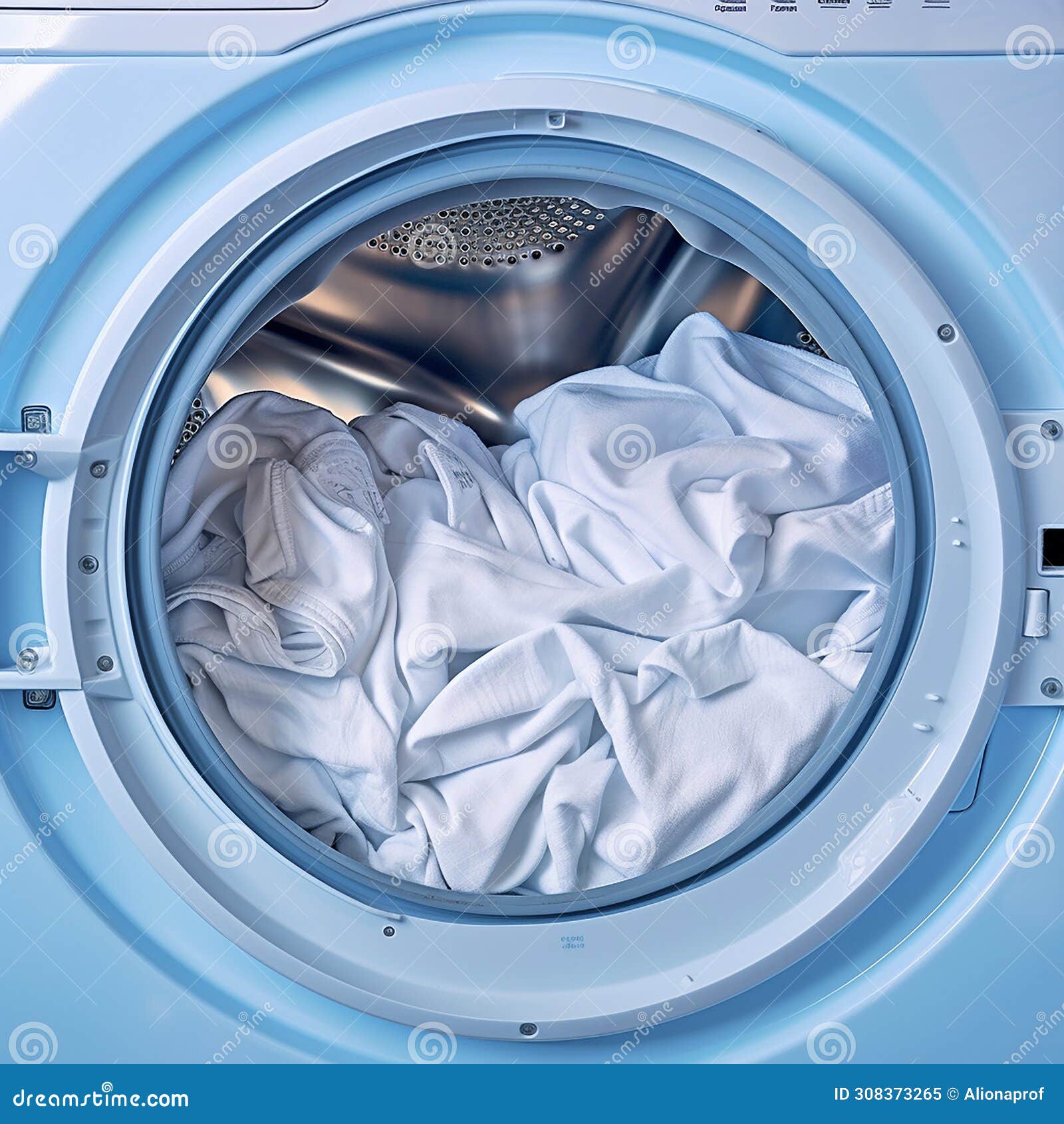 Washing Machine with Clothes Inside, Closeup. Laundry Concept Stock ...