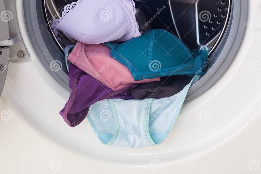 Washing Machine Full of Dirty Clothes. Stock Image - Image of ...