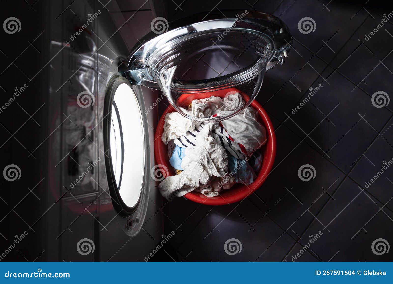 Washing Machine Glows from Inside in a Dark Laundry Room Stock Photo ...