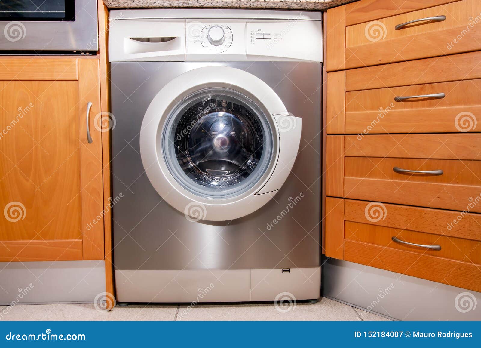 Washing Machine on the Kitchen Stock Image - Image of clothes, hygiene ...