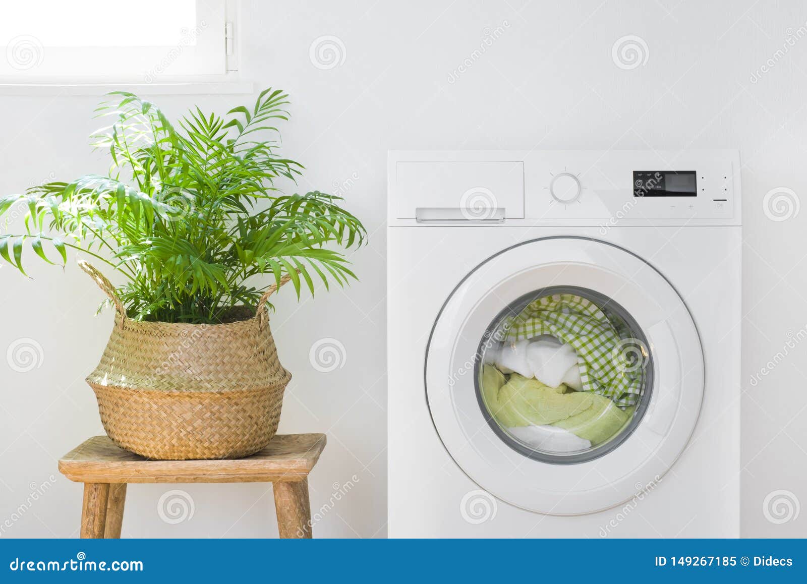 Washing Machine with Laundry, Plant Pot and Sunlight from Window Stock ...