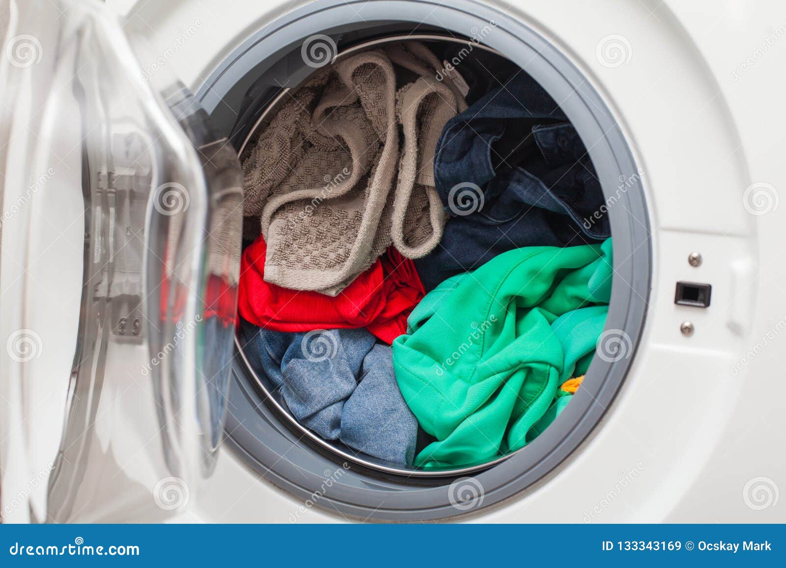 Washing Machine Loaded with Clothes Stock Image - Image of green, color ...