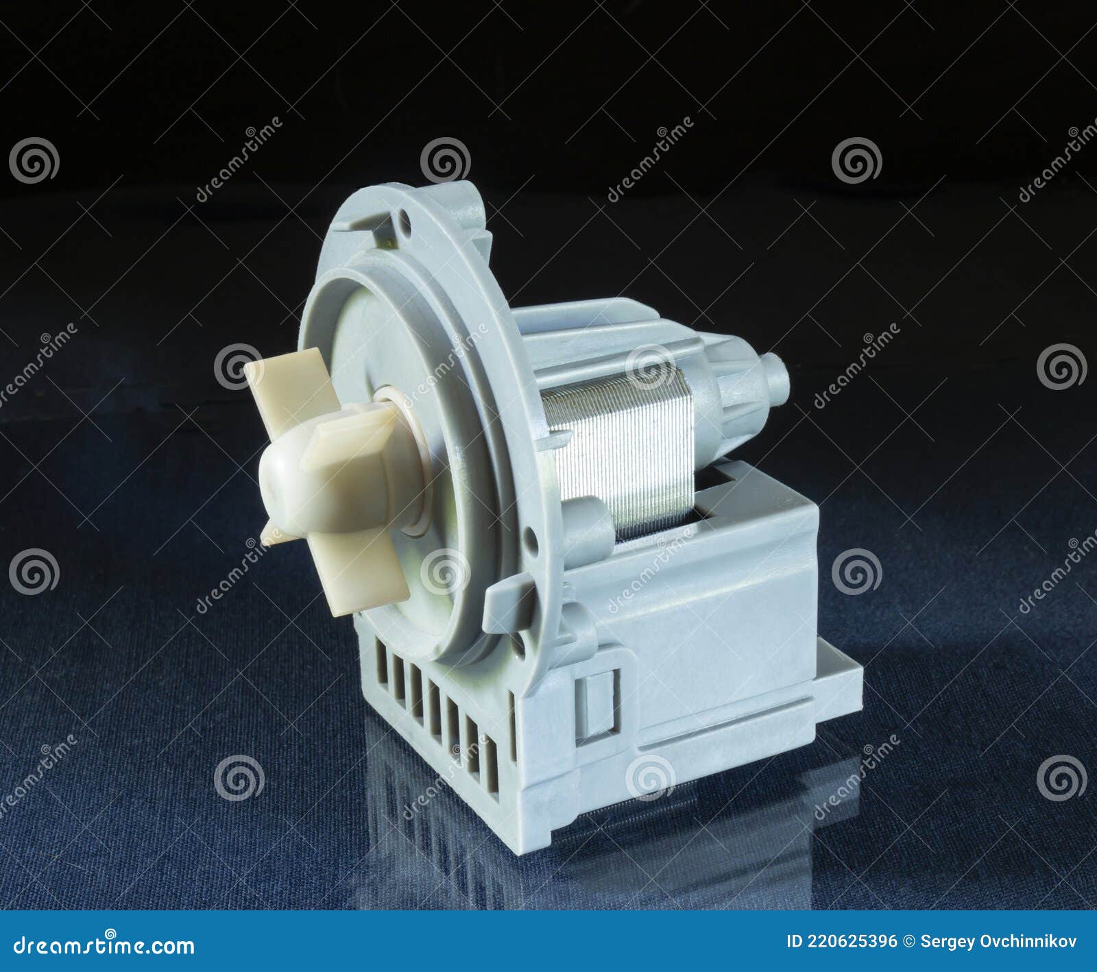 Washing Machine Pump on Blue Table with Reflection Stock Photo - Image ...
