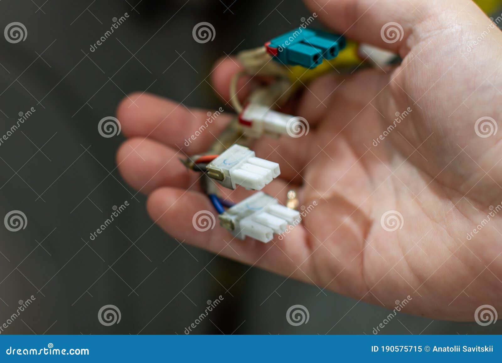 Washing Machine Repair. Wire, Plug for Connection in the Hand of the ...