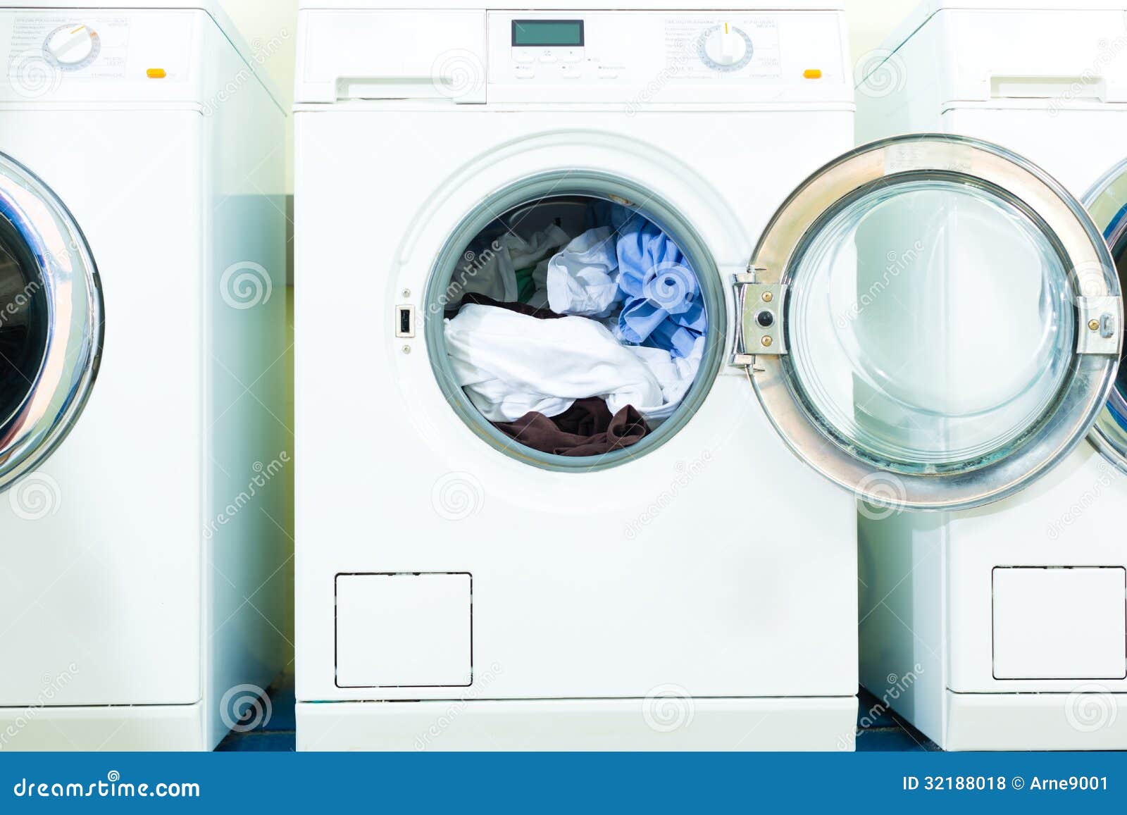 Washing Machines in a Laundry Stock Photo - Image of machine, coloreds ...