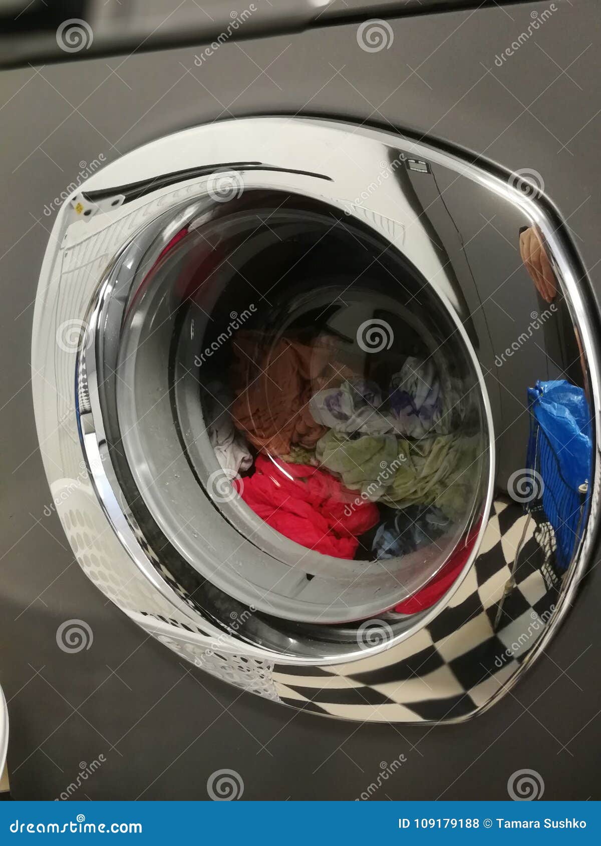 Washing Mashine with Clothes Stock Photo - Image of clean, color: 109179188