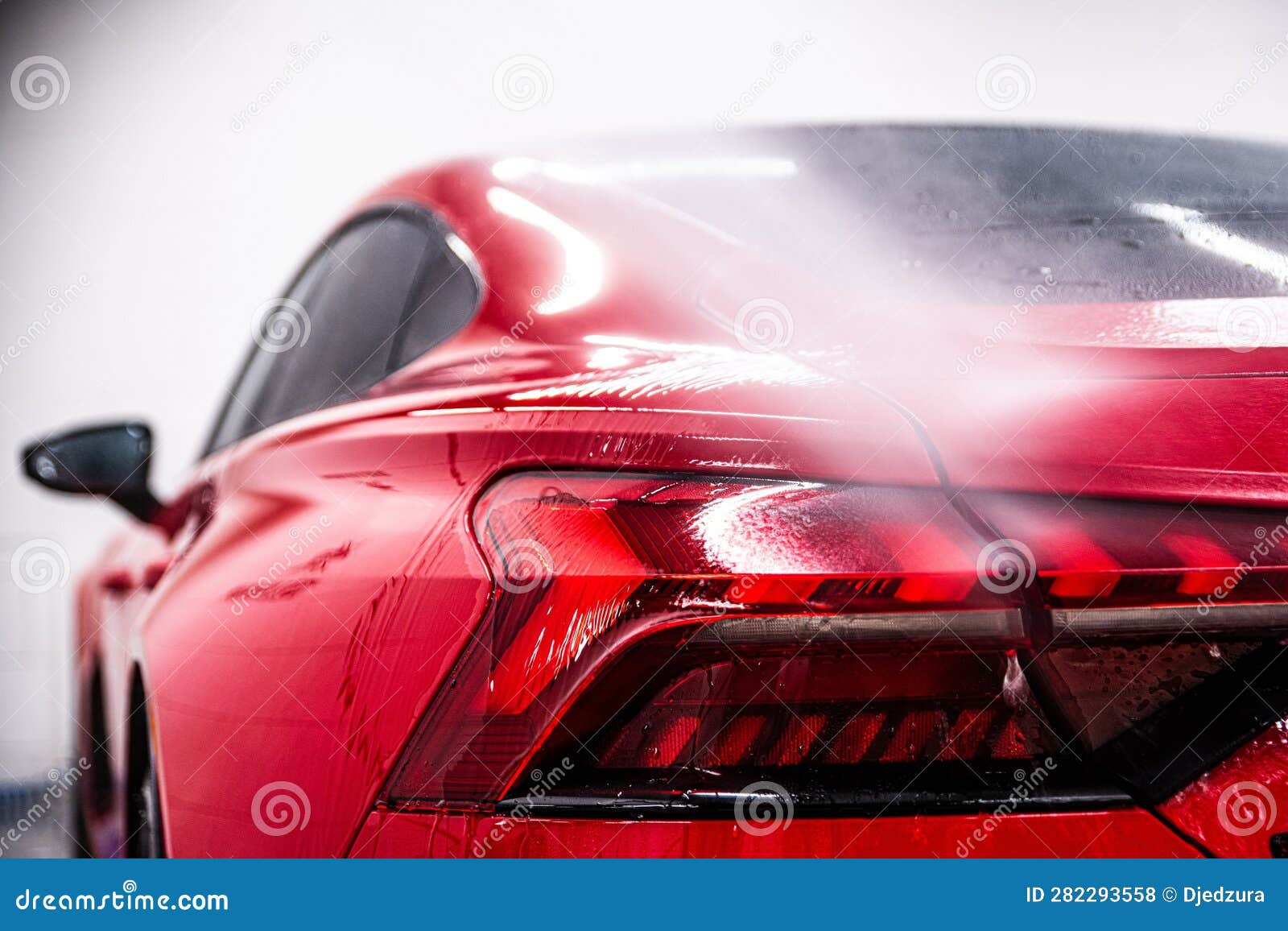 Washing a Modern Red Car at a Car Wash Using a Pressure Washer Stock ...