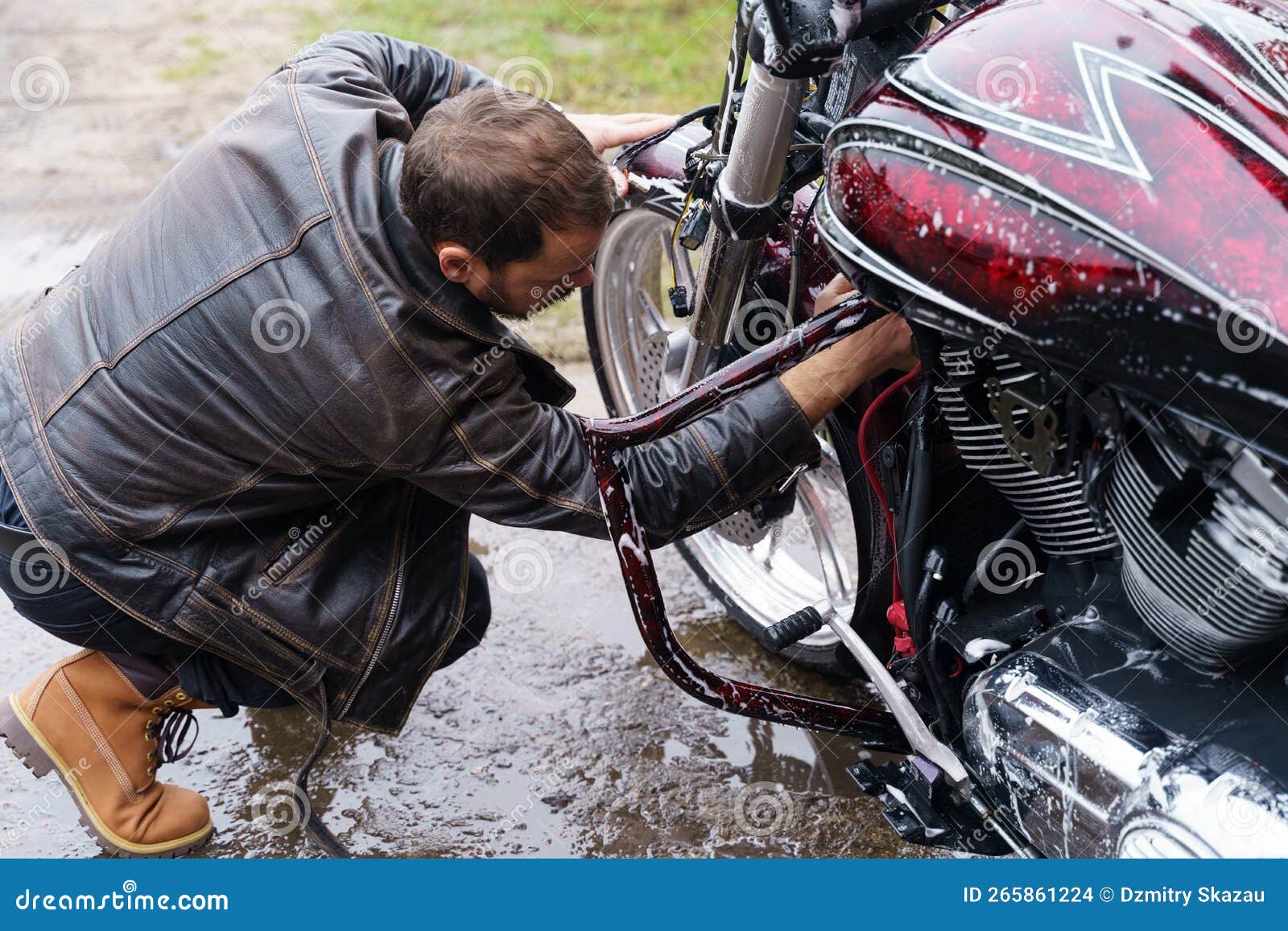 Washing a Motorcycle Engine with a Detergent Using a Sponge. Stock ...